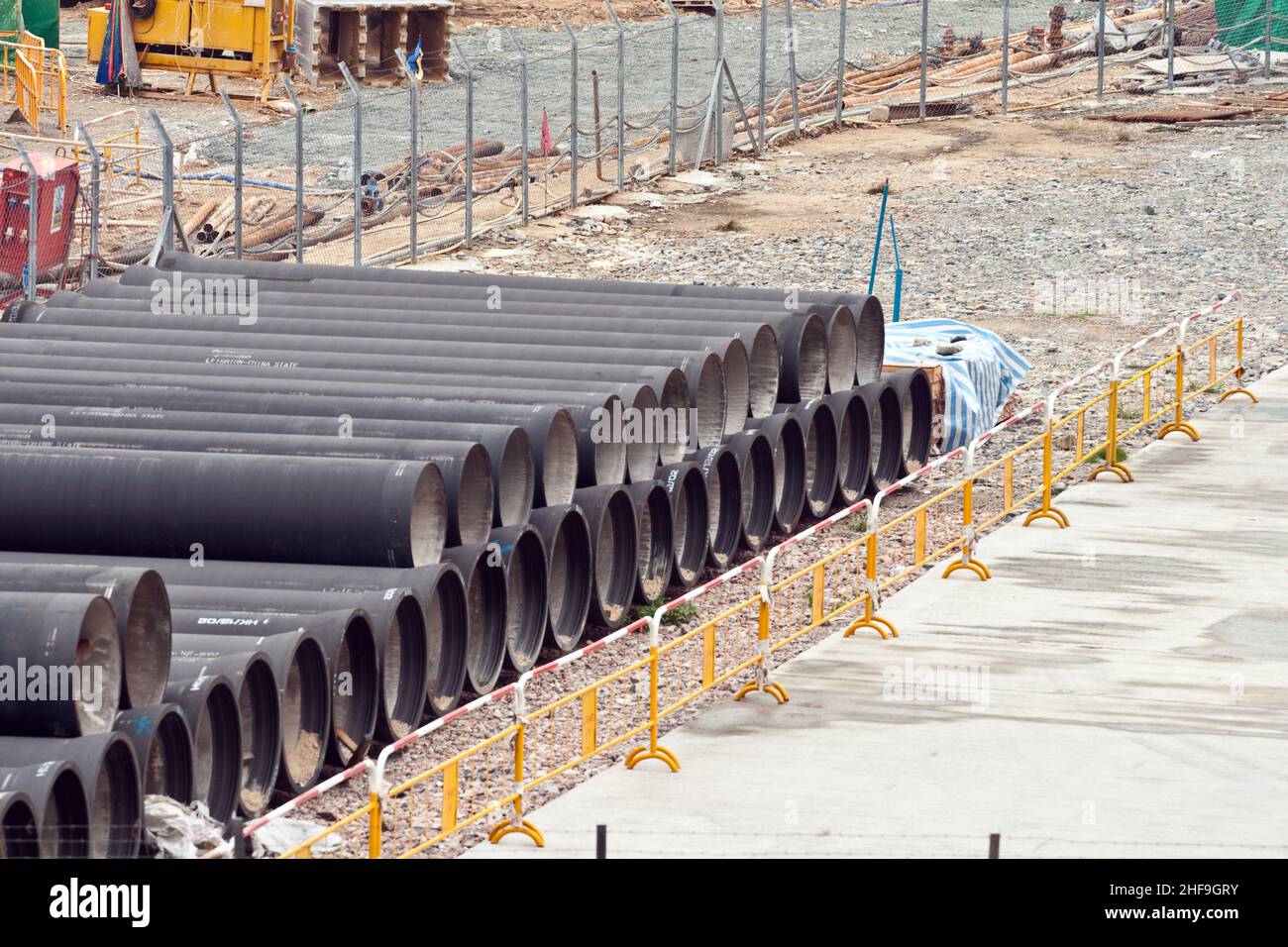 huge water pipes are stored at the building site Stock Photo - Alamy