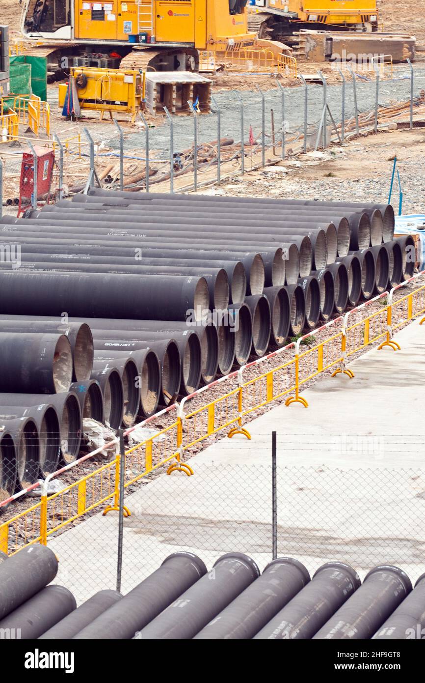 huge water pipes are stored at the building site Stock Photo - Alamy