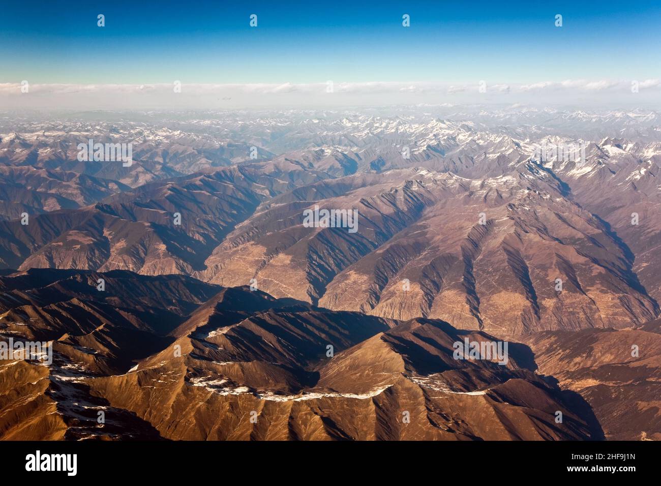 beautiful view from the aircraft to the mountains of the Himalaya on ...