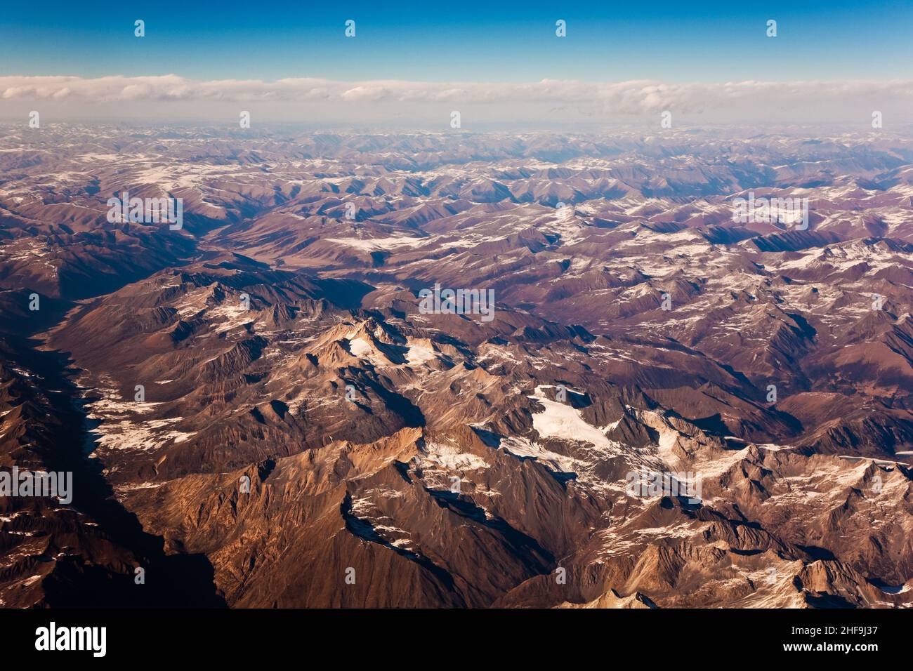 beautiful view from the aircraft to the mountains of the Himalaya on ...
