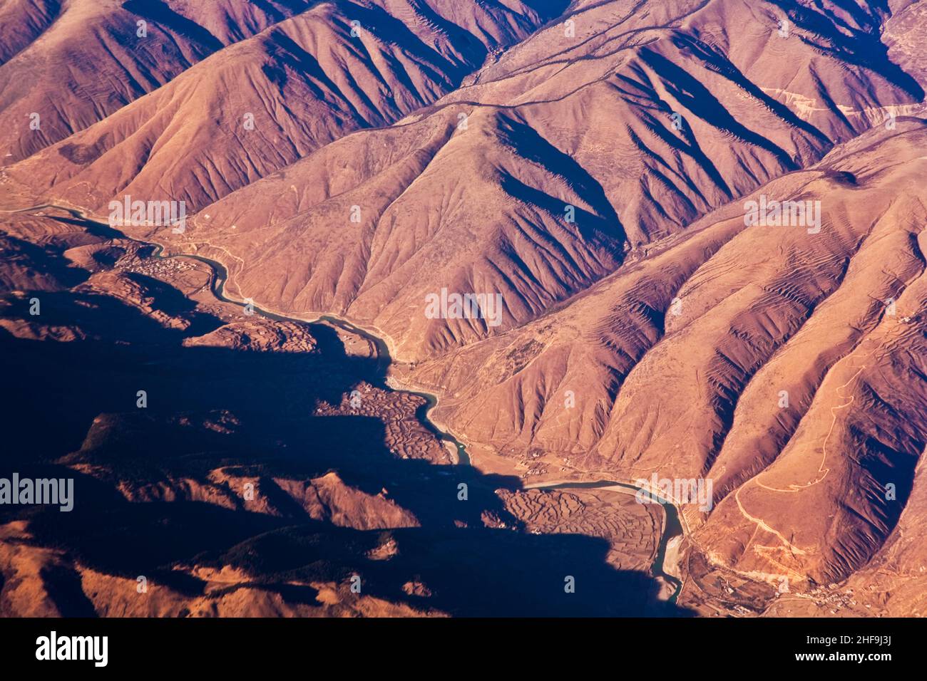 beautiful view from the aircraft to the mountains of the Himalaya on ...