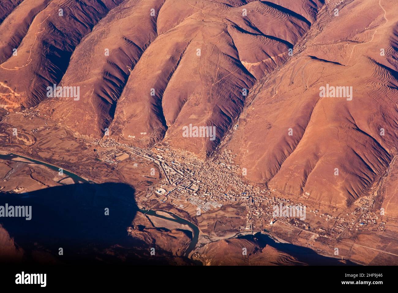 beautiful view from the aircraft to the mountains of the Himalaya on ...