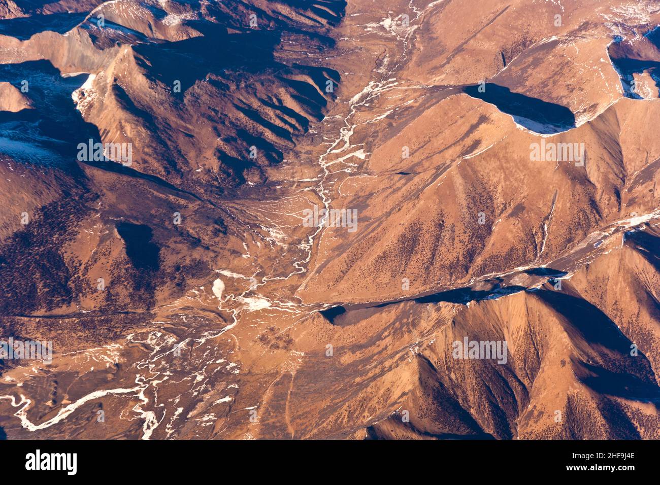 beautiful view from the aircraft to the mountains of the Himalaya on ...