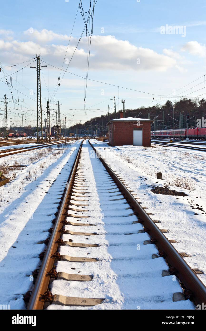 rails in winter at the station Stock Photo - Alamy