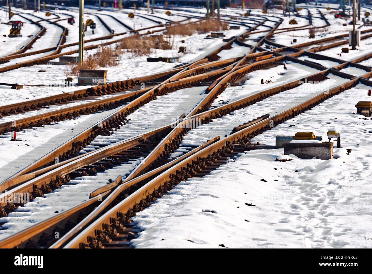 rails in winter at the station Stock Photo - Alamy