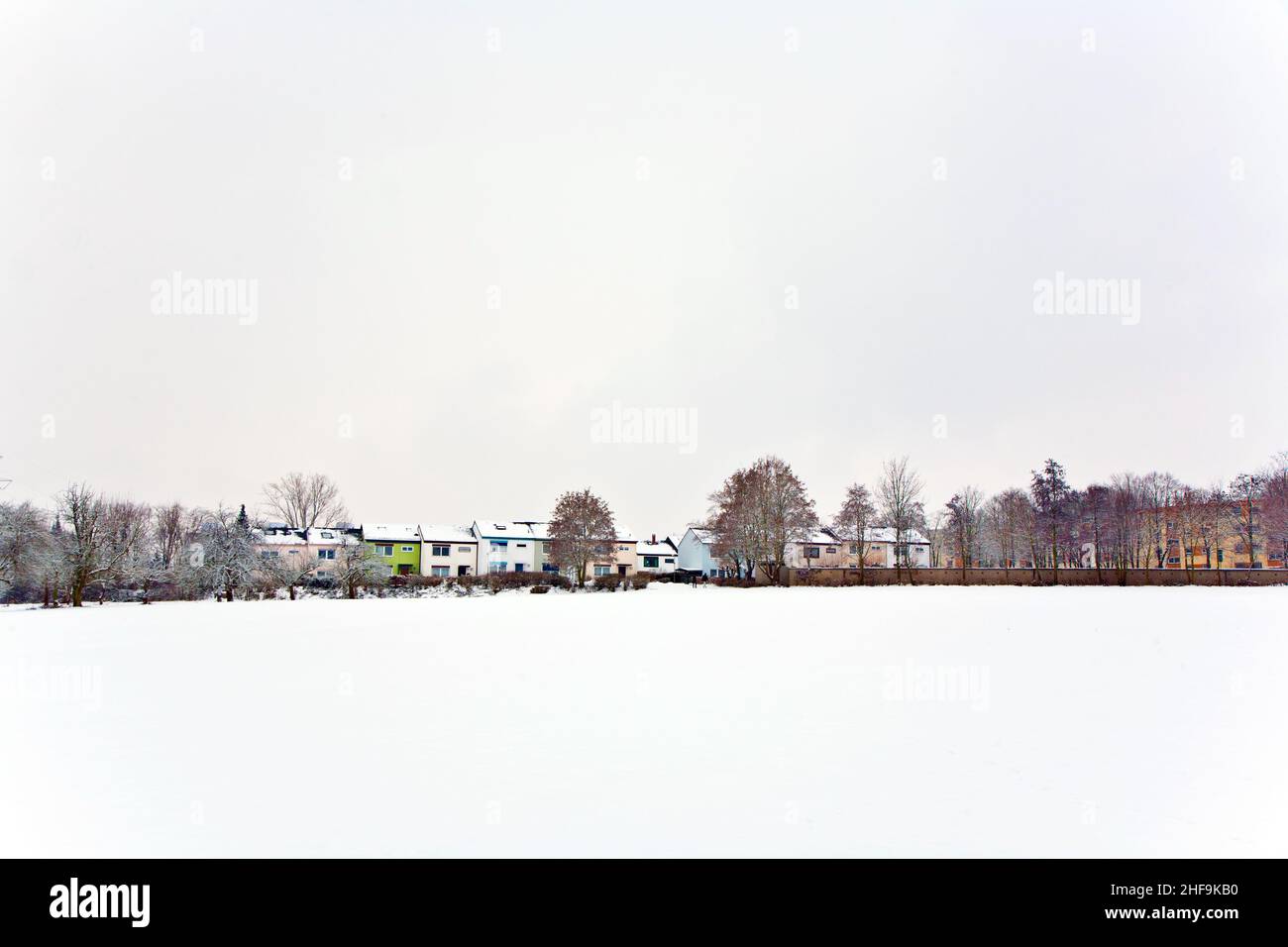 settlement in winter landscape Stock Photo - Alamy