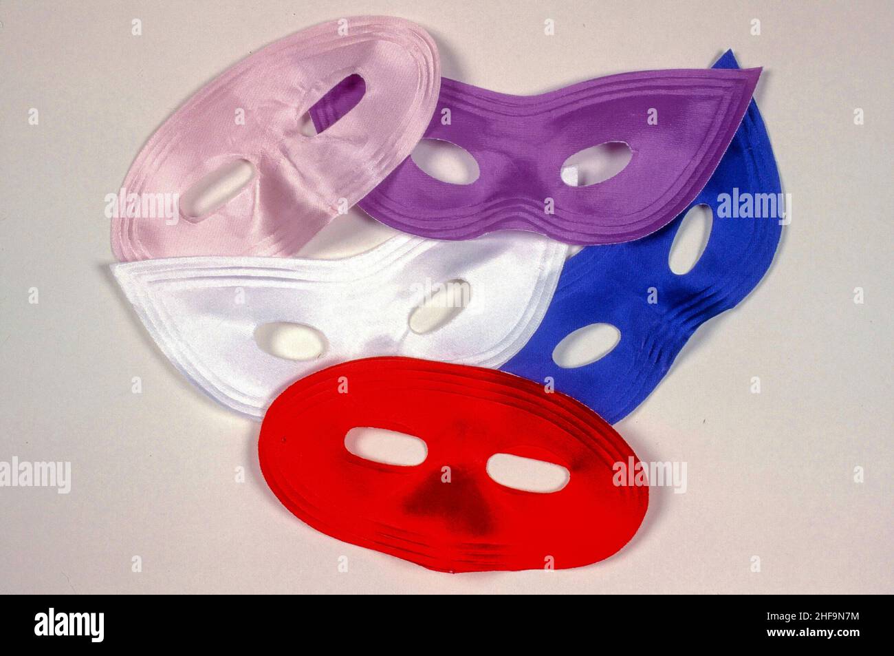 Red, white, blue, purple and pink masquerade masks Stock Photo - Alamy