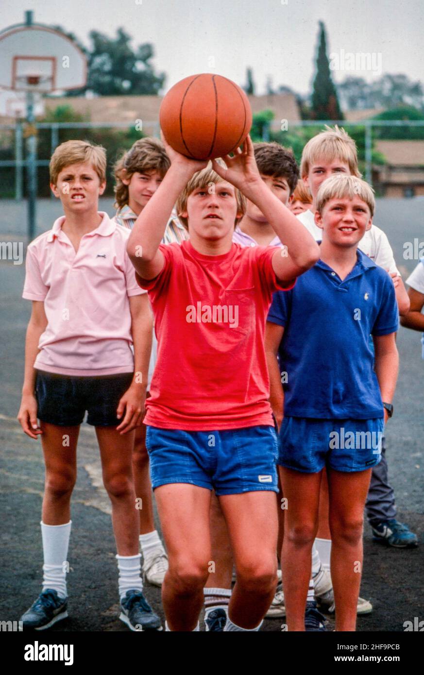 Boy watching team mates hi-res stock photography and images - Alamy