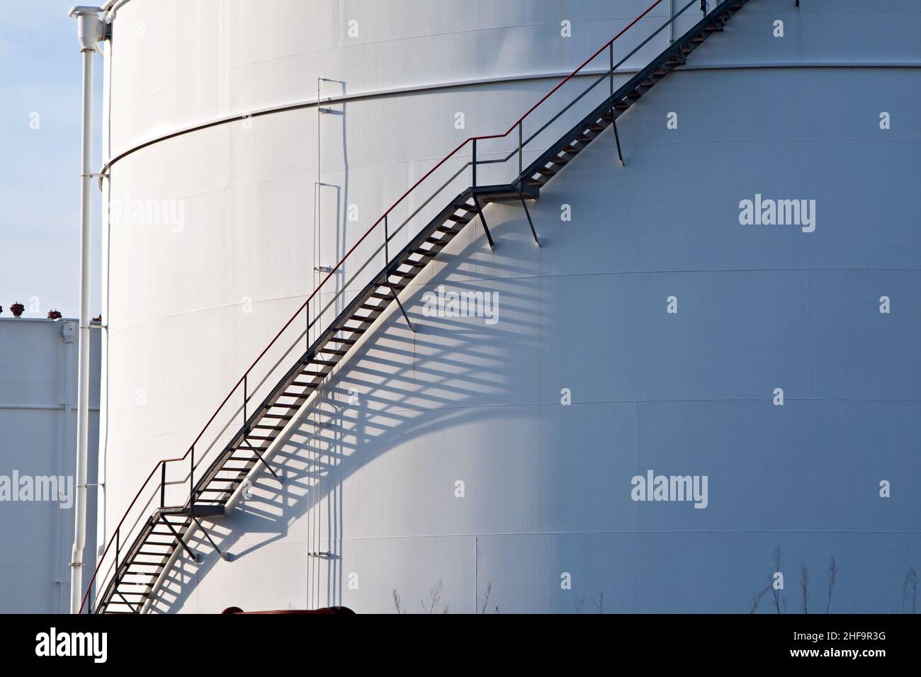industrial stair at white tank in tank farm Stock Photo - Alamy