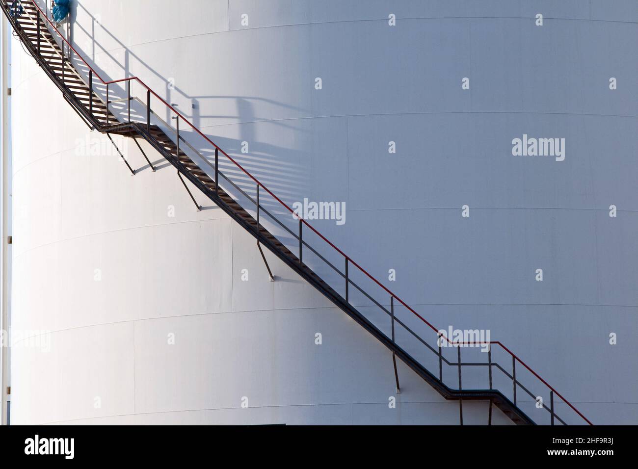 industrial stair at white tank in tank farm Stock Photo - Alamy