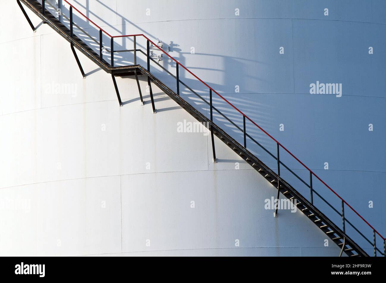 industrial stair at white tank in tank farm Stock Photo - Alamy