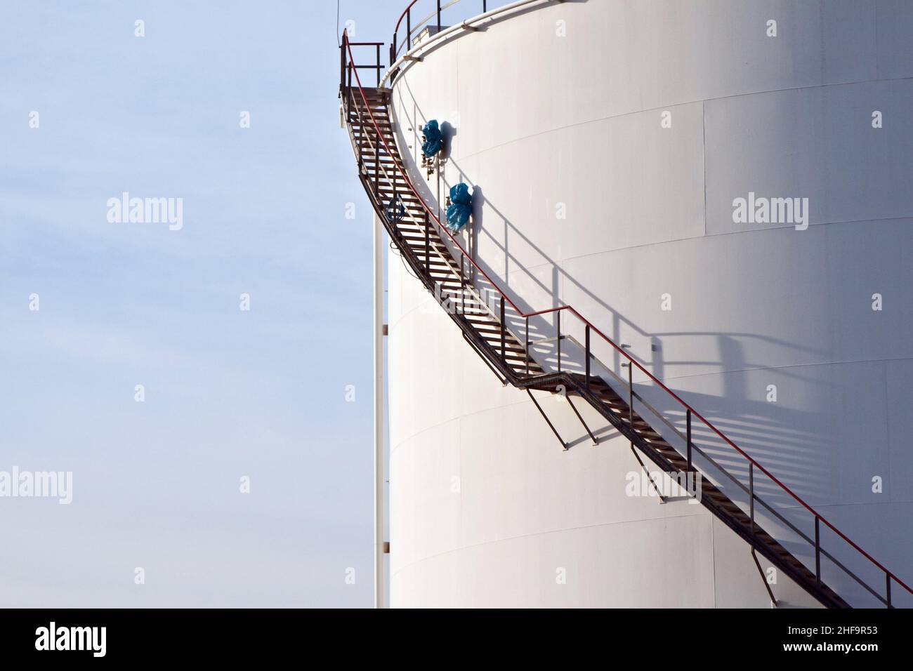 industrial stair at white tank in tank farm Stock Photo - Alamy