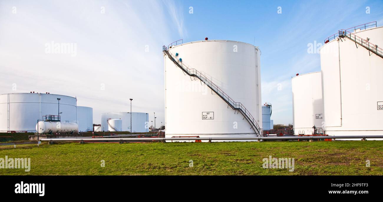 white tanks for petrol and oil in tank farm with blue sky Stock Photo ...