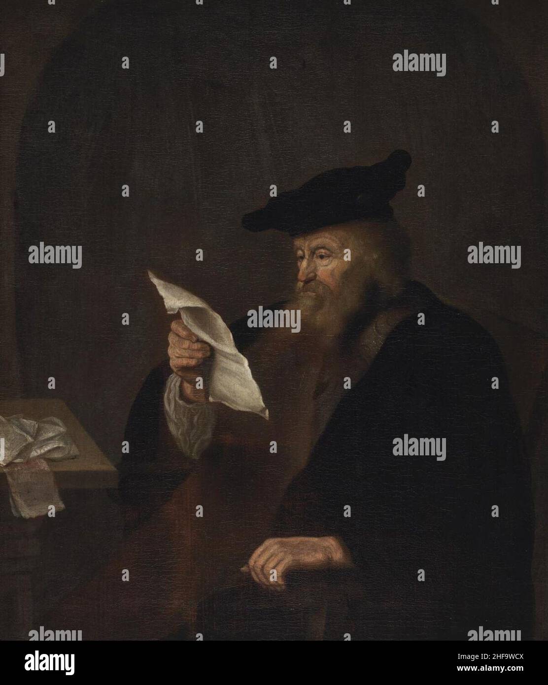 Scholar reading in study Stock Photo - Alamy