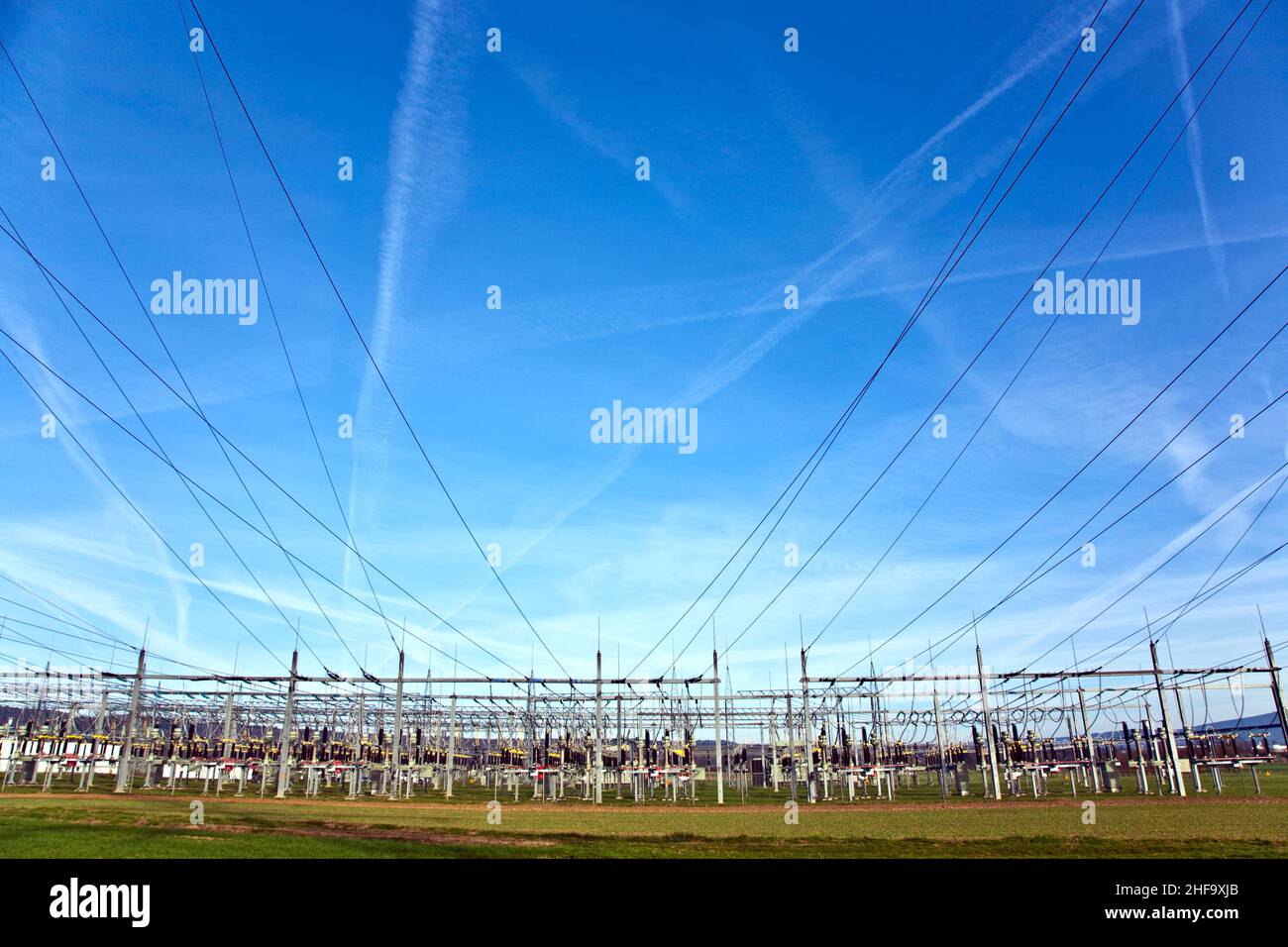 electrical power station in beautiful landscape with sky Stock Photo ...