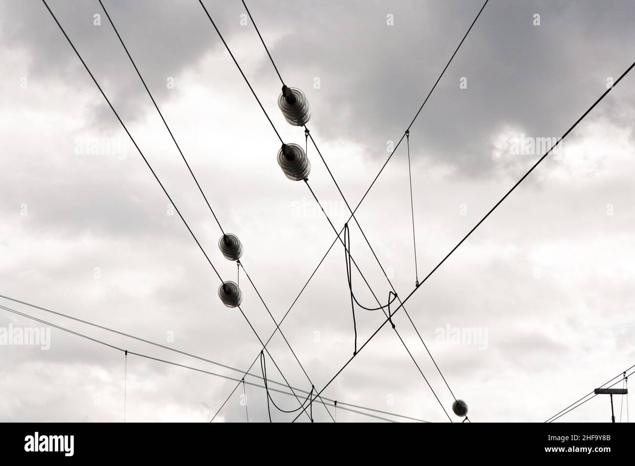 railway wire of the high tension line Stock Photo - Alamy