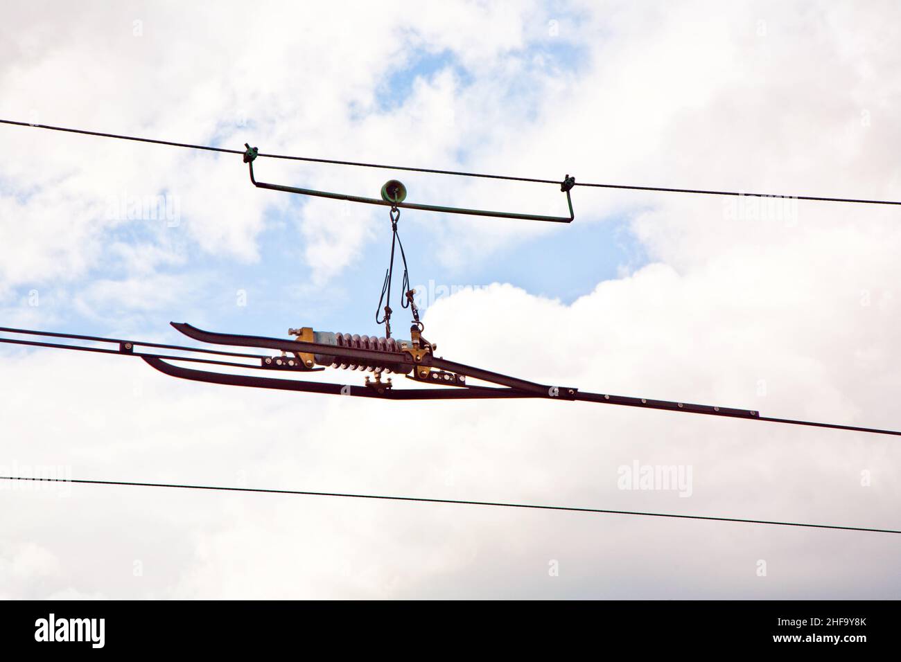 railway wire of the high tension line Stock Photo - Alamy