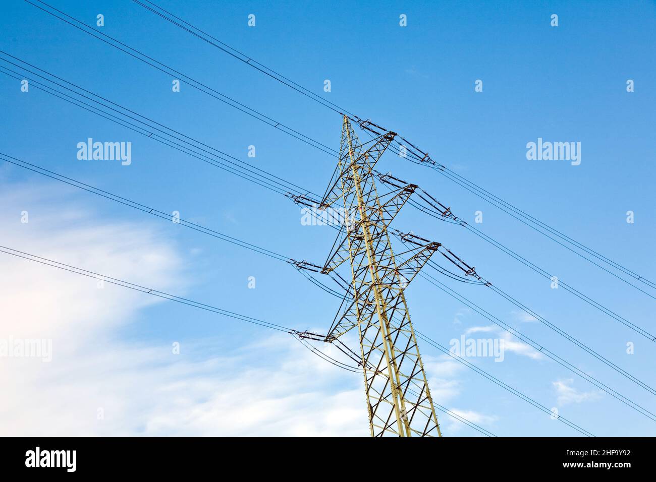 power pole with blue sky background and white clouds Stock Photo - Alamy