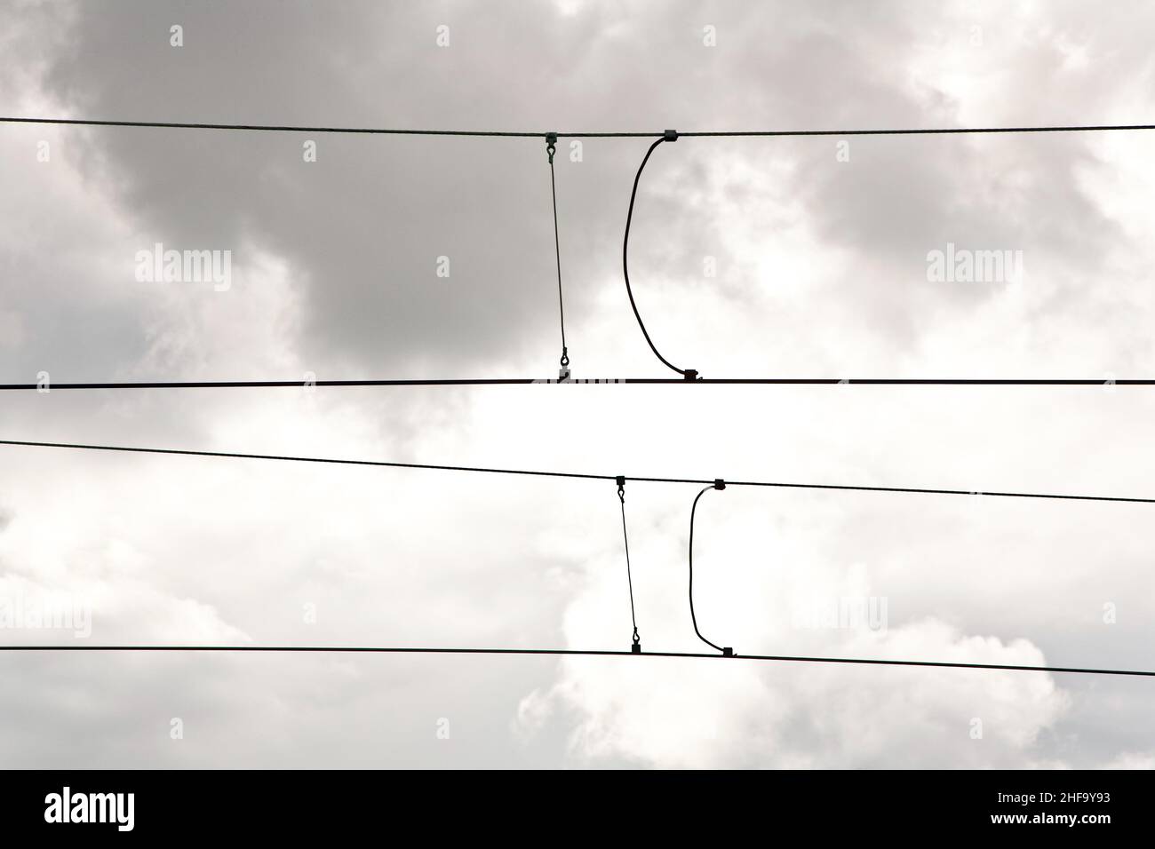 railway wire of the high tension line Stock Photo - Alamy