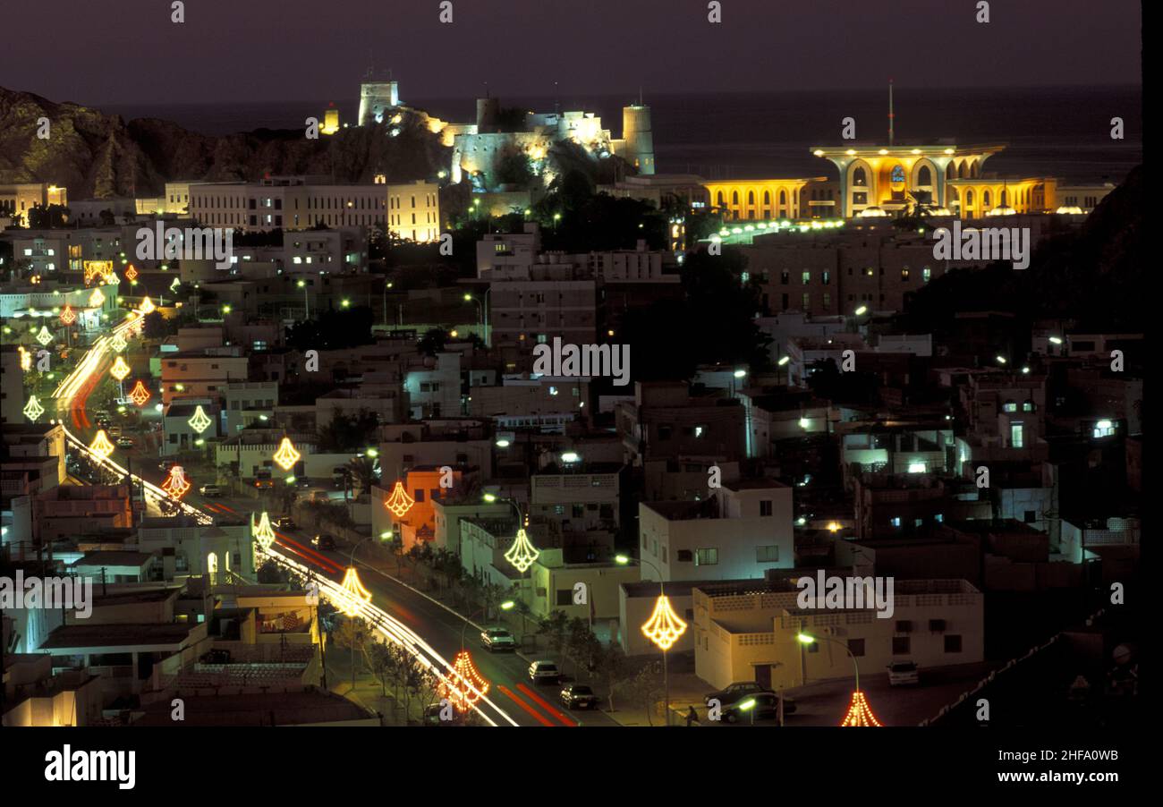 Night view of old Muscat with palace and forts, Oman 1990 Stock Photo ...