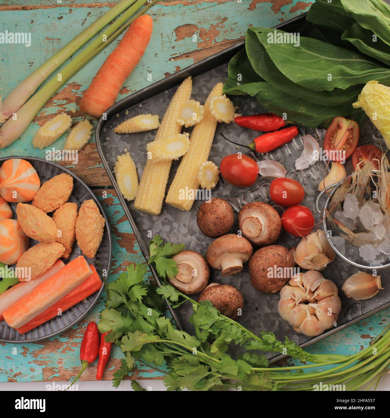 Tom Yam Kung (thai food) ,prawn with squid, kaffir lime leaves ...