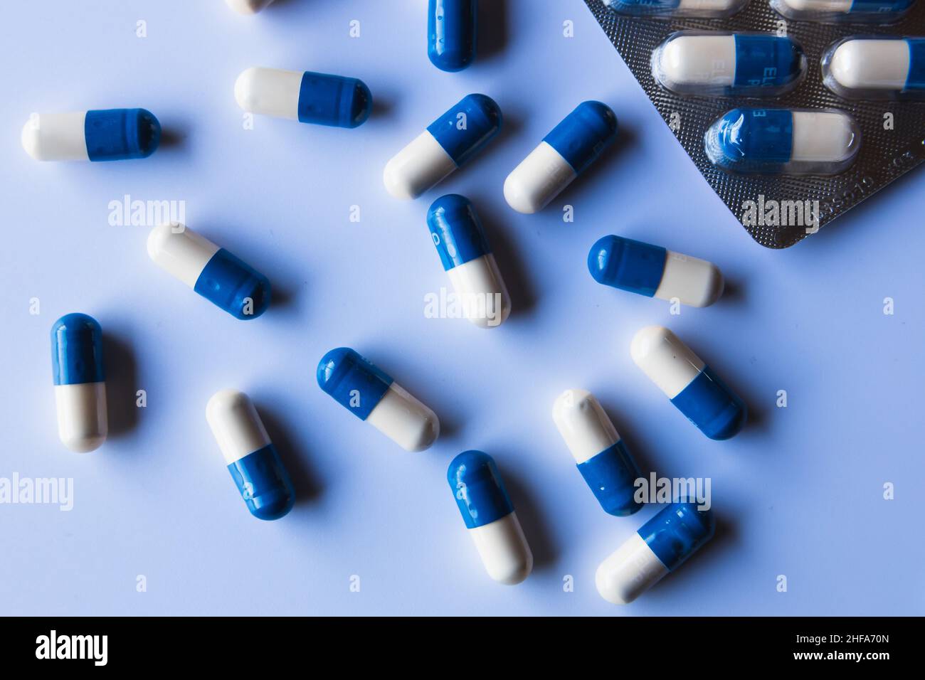 Capsules over a white background. Medical and pharmaceutical concept ...