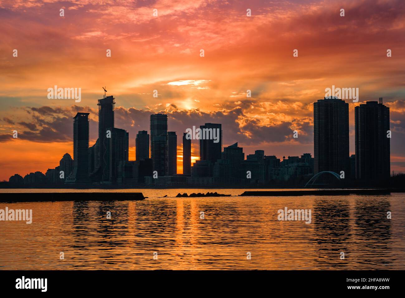 sunset in city. panorama skyline. Warm colors cloudy sky, modern ...