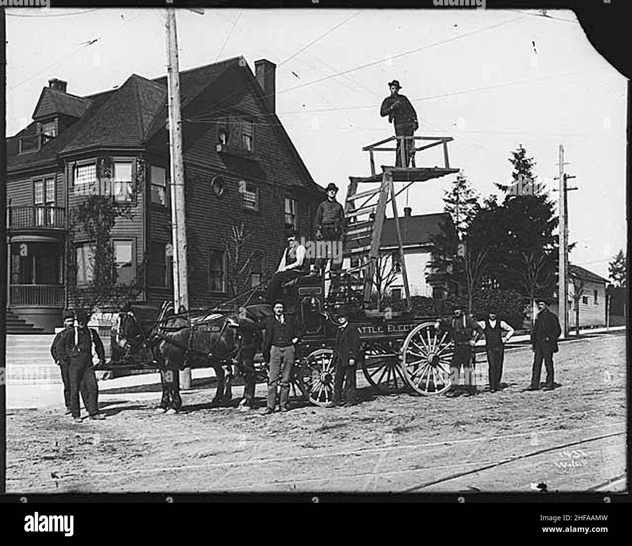 Seattle Electric Co workers with wagon, Seattle, ca 1900 Stock Photo ...
