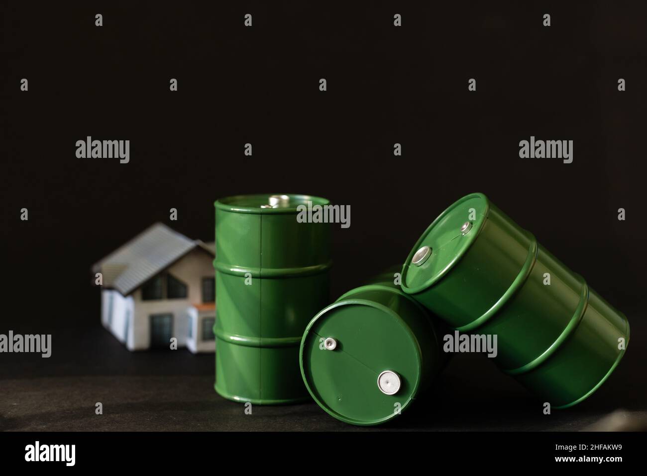 tin barrels and house mockup Stock Photo - Alamy