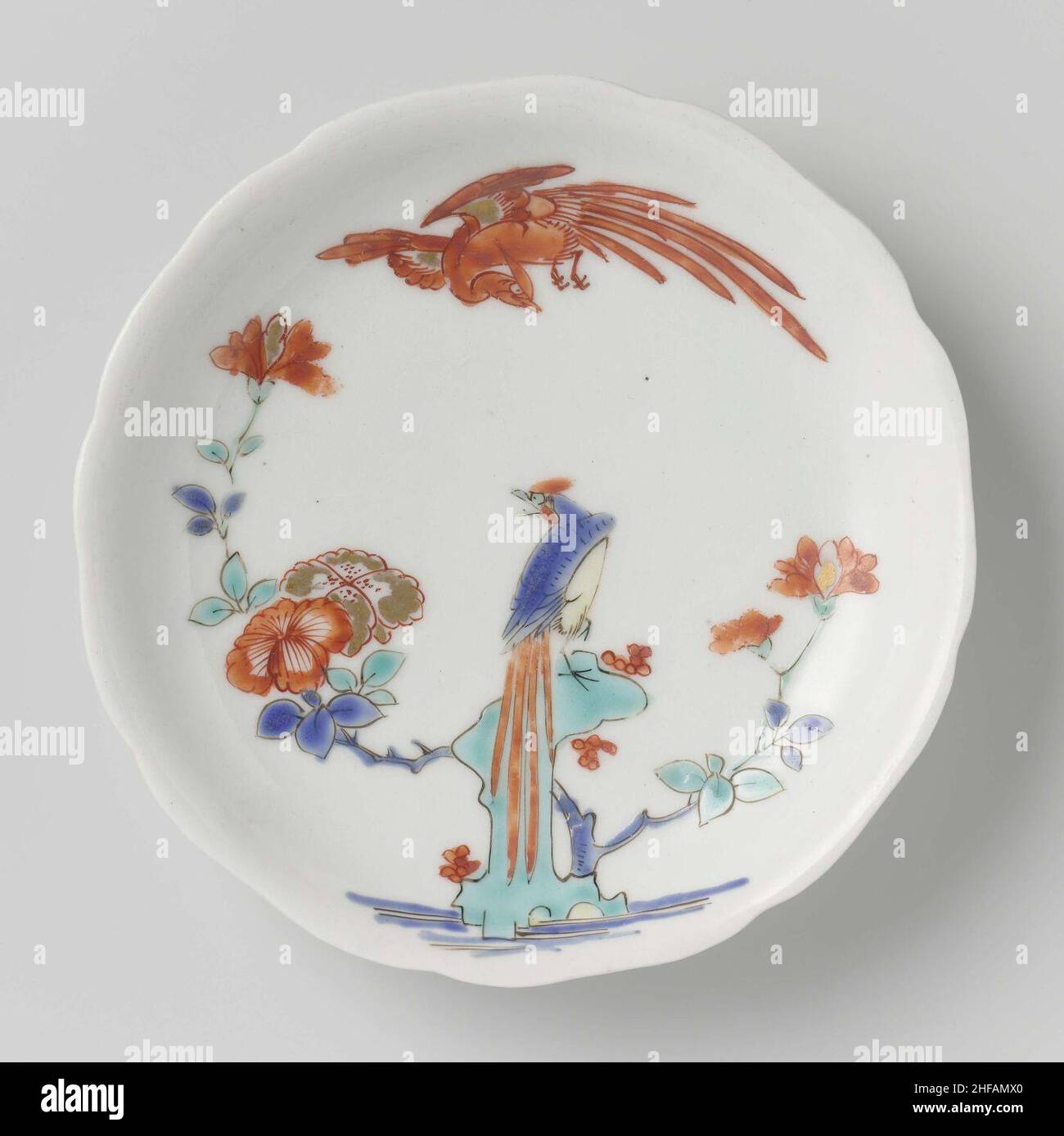 Scalloped dish with hoo birds Stock Photo - Alamy