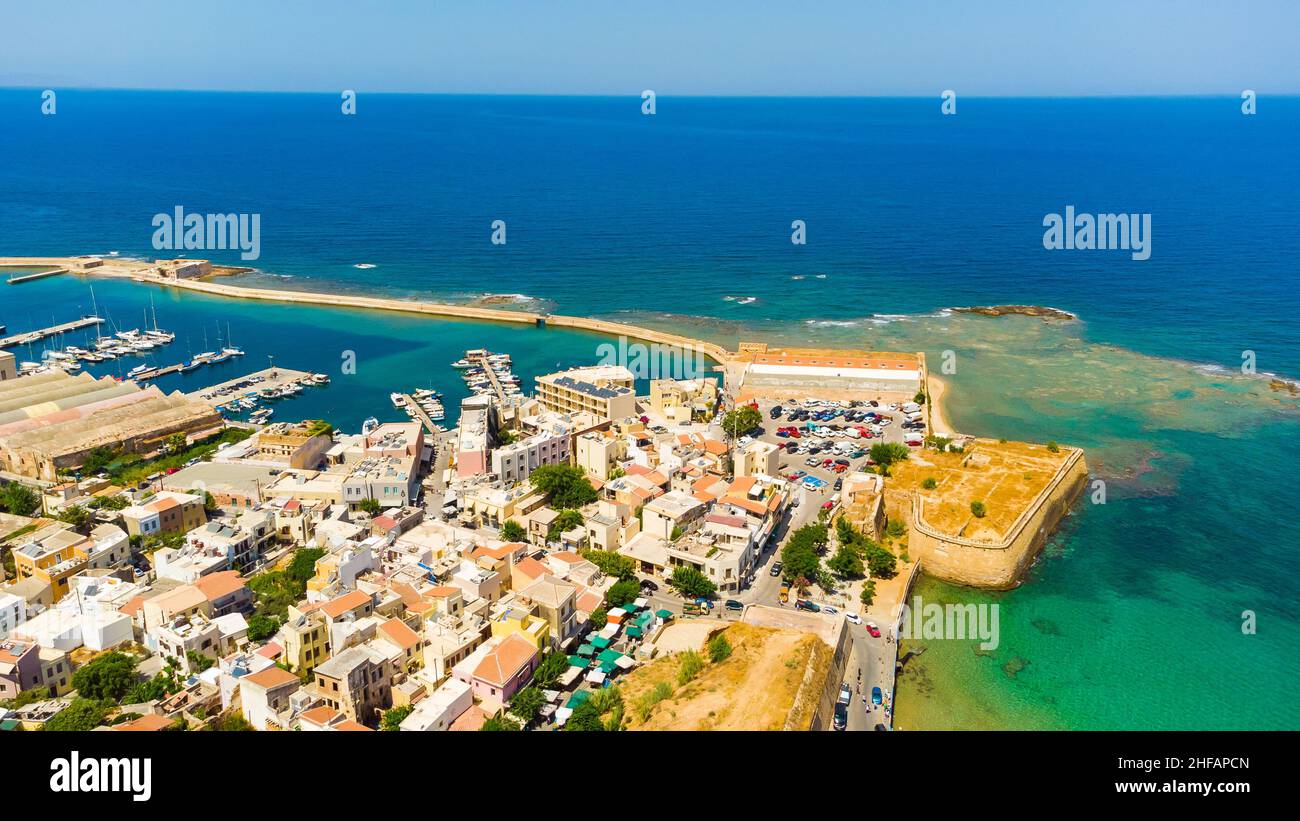Aerial view of the beautiful city of Chania with it's old harbor and ...