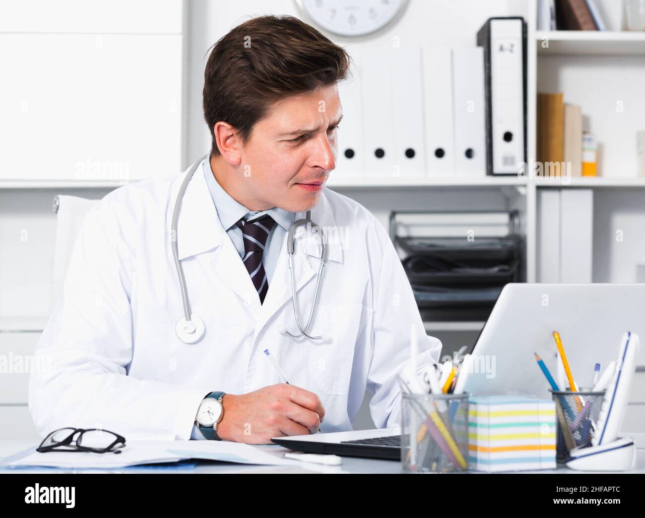 Portrait male therapist table in hi-res stock photography and images ...