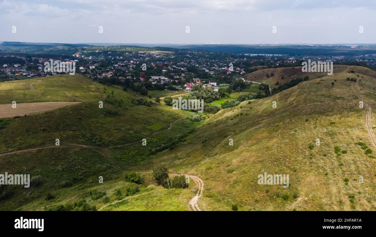 Extensive rural landscape with patches of fields, orchards and hedges ...