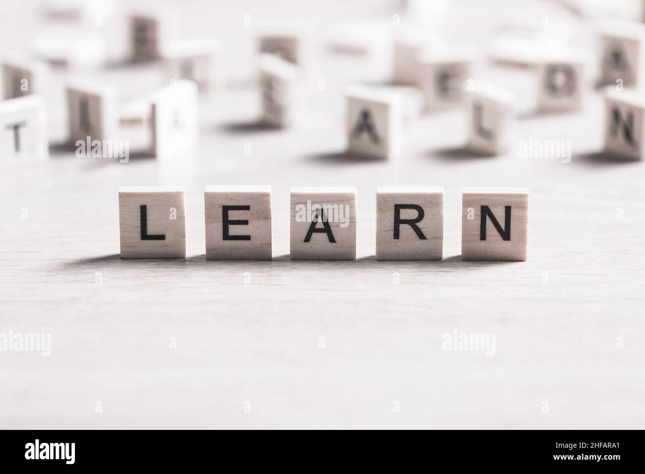 wooden elements with letter collected word learn Stock Photo - Alamy