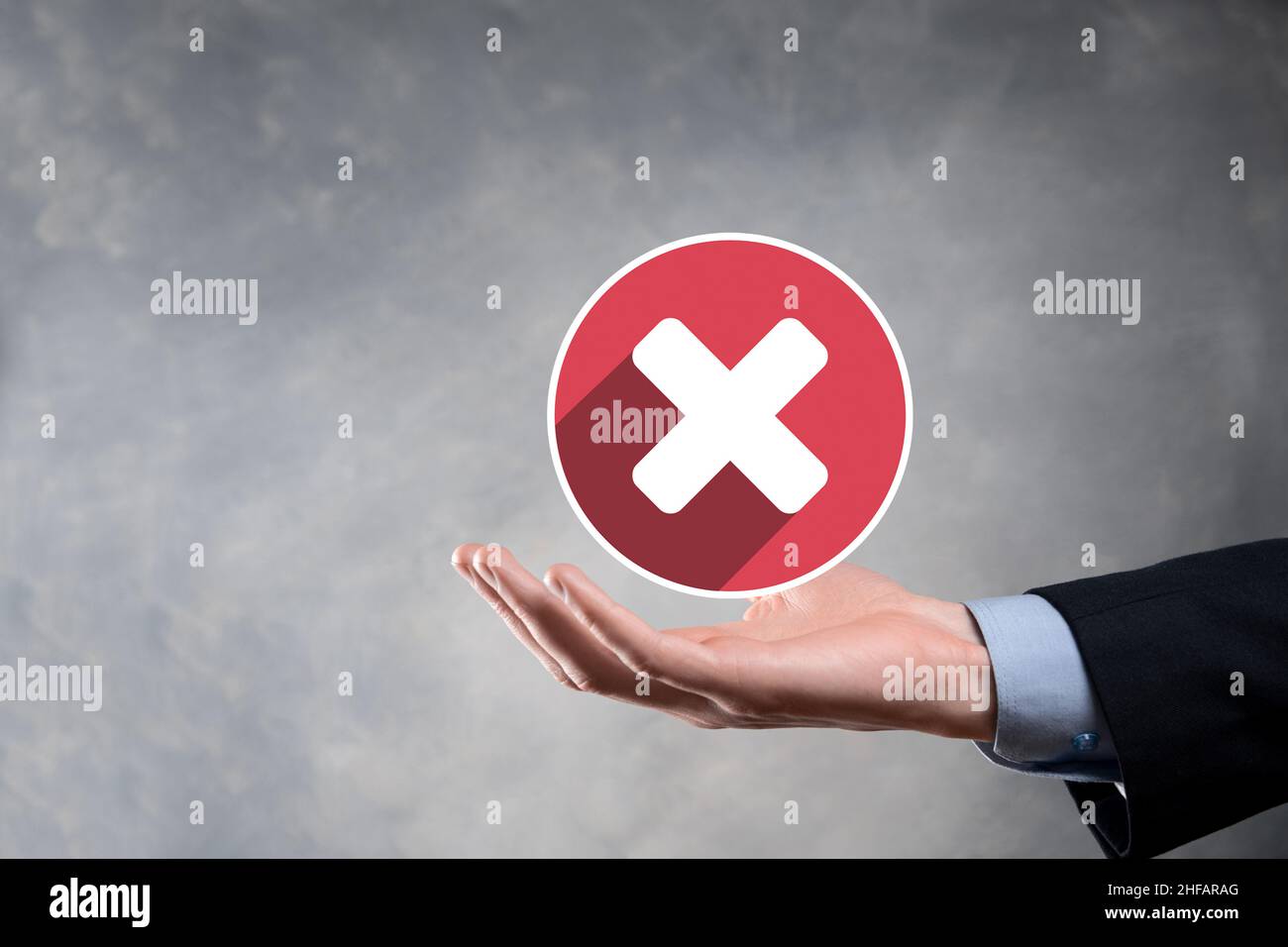 Hand holds icon,cancellation symbol,cancel icon.Cross mark flat red ...