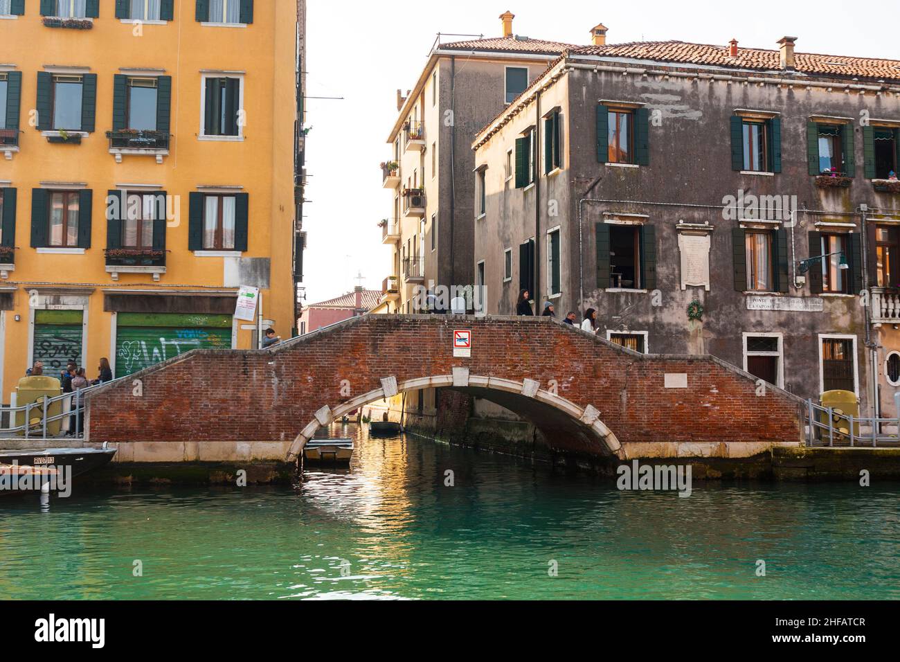 Bridge on canal and houses around in Venice, Italy Stock Photo - Alamy