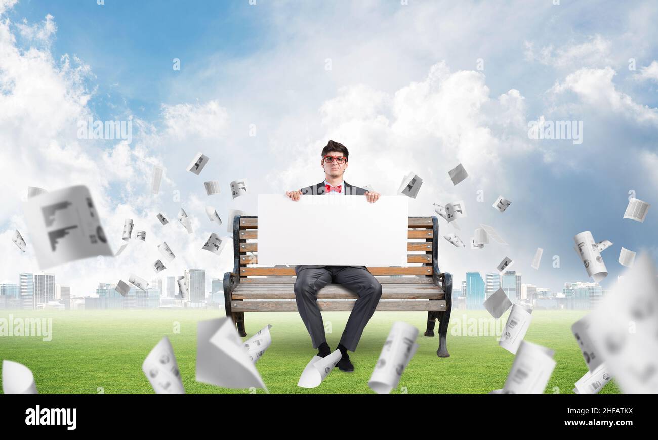 businessman with an empty banner Stock Photo - Alamy