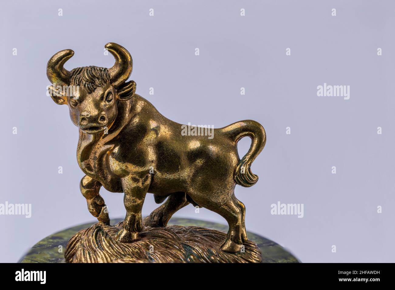 Beautiful view of bronze figure of Taurus cattle sign isolated on ...