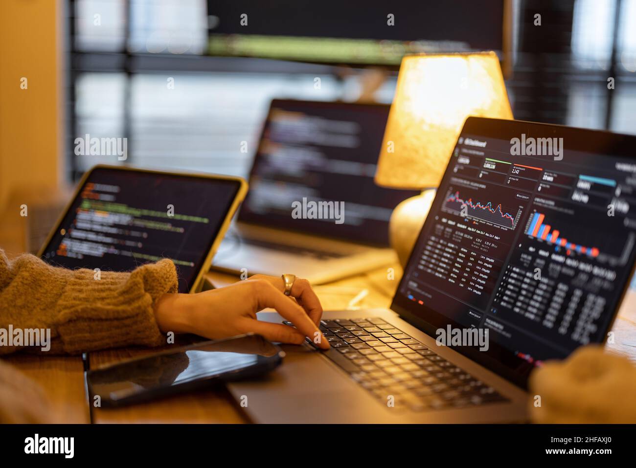 Working on programming dashboard on laptop Stock Photo - Alamy