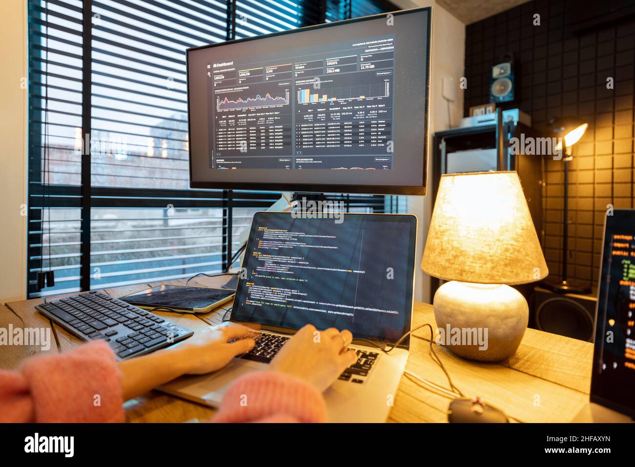 Female programmer writing programming code at cozy home workplace Stock ... Female programmer writing programming code at cozy home workplace Stock ...