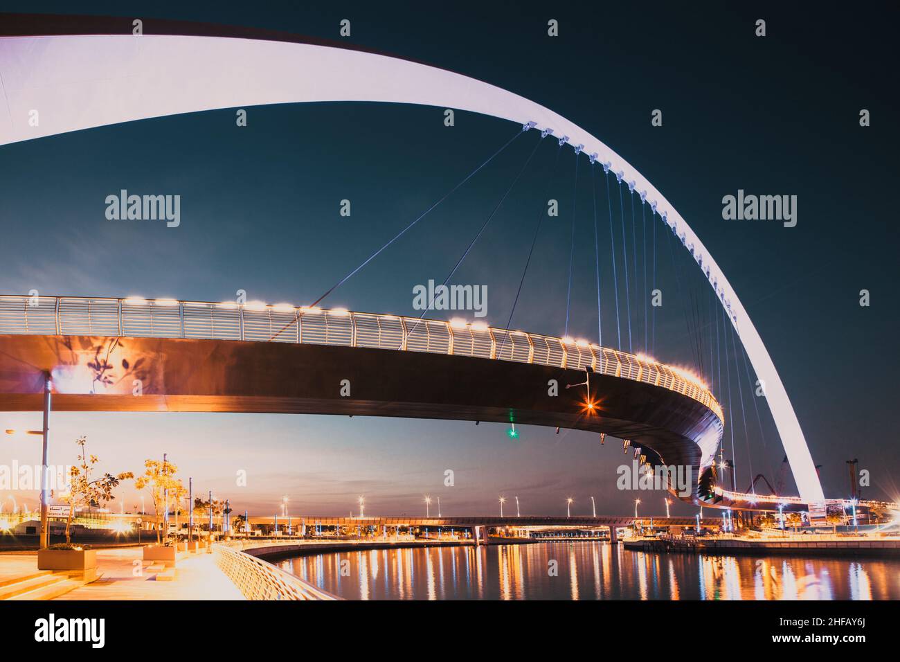 Blue arch bridge dubai water hi-res stock photography and images - Alamy