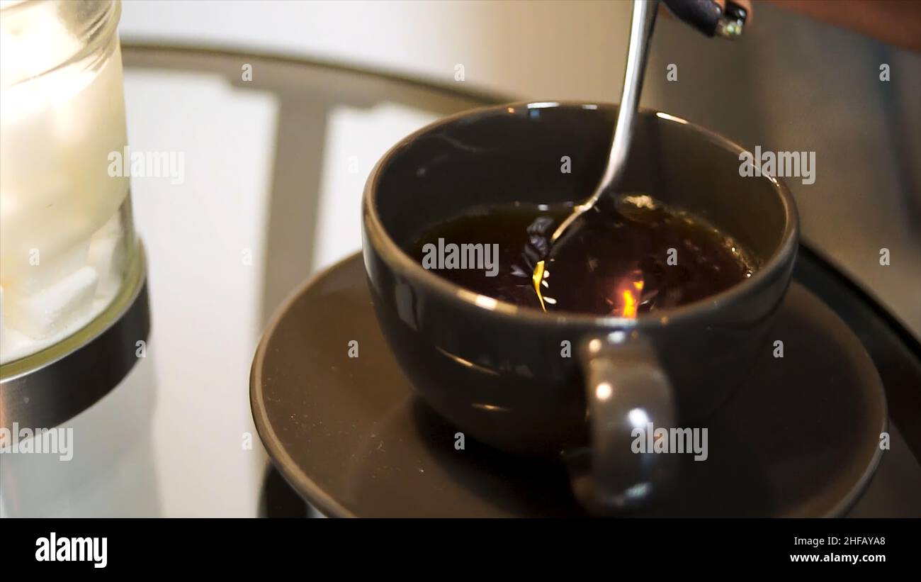 Stirring drink closeup in slow hi-res stock photography and images - Alamy