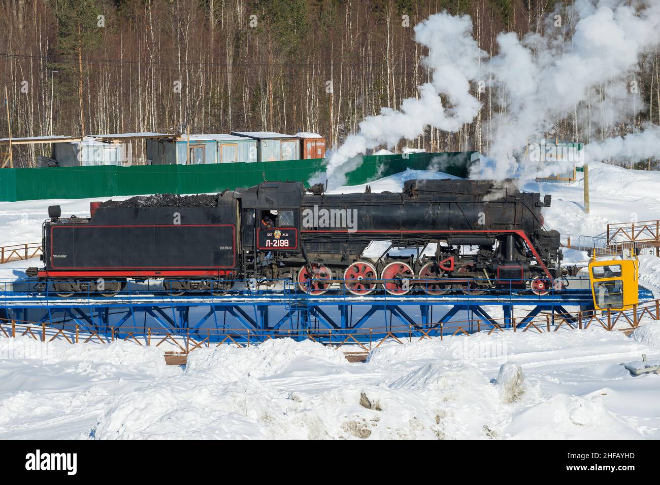 Old Soviet mainline freight steam locomotive L-2198 on a turning circle ...