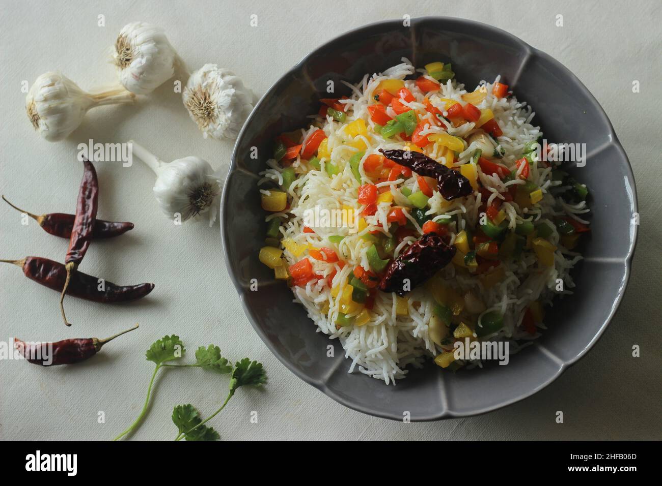 Rice with sauteed bell peppers. Steamed basmati rice tossed with ...