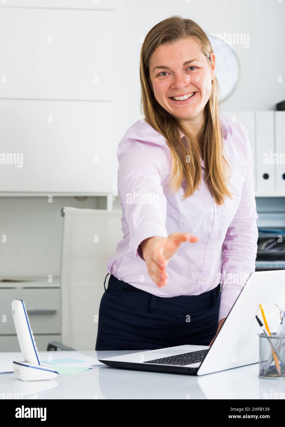 Female manager ready for clients Stock Photo - Alamy