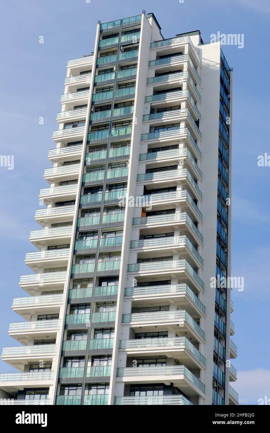 Modern luxury multistory building ground view. Modern residential block ...