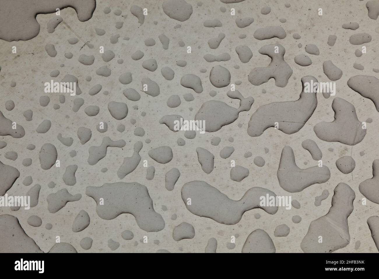 water on silver table gives a harmonic pattern and fantasy creates ...