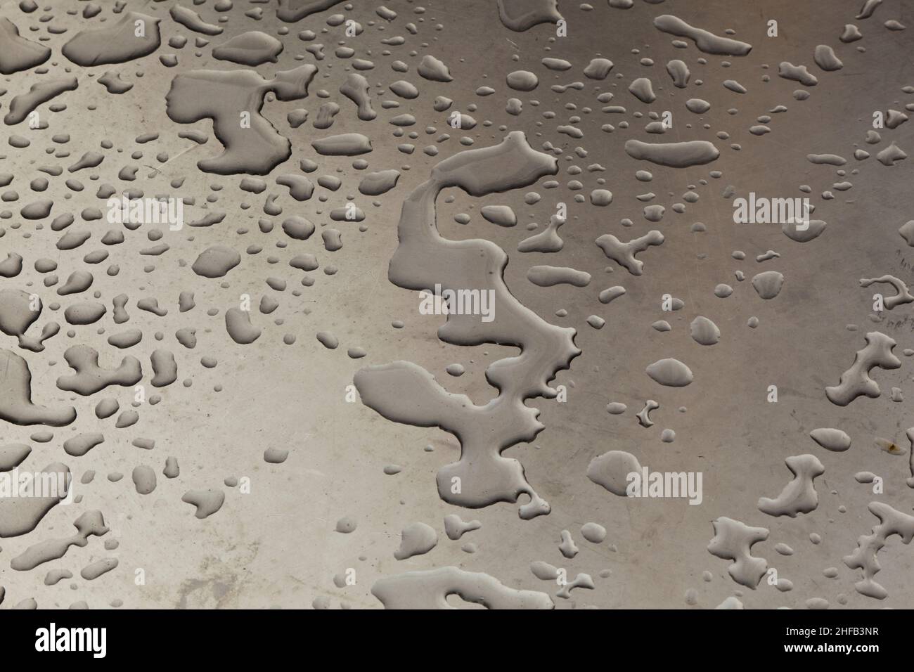 water on silver table gives a harmonic pattern and fantasy creates ...