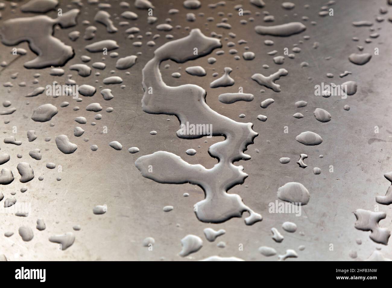 water on silver table gives a harmonic pattern and fantasy creates ...