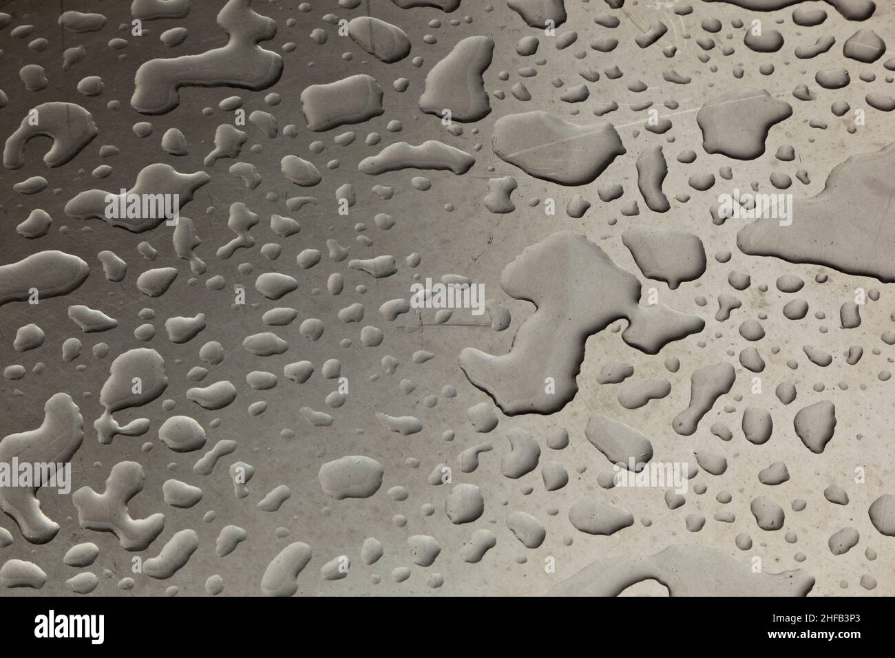 water on silver table gives a harmonic pattern and fantasy creates ...